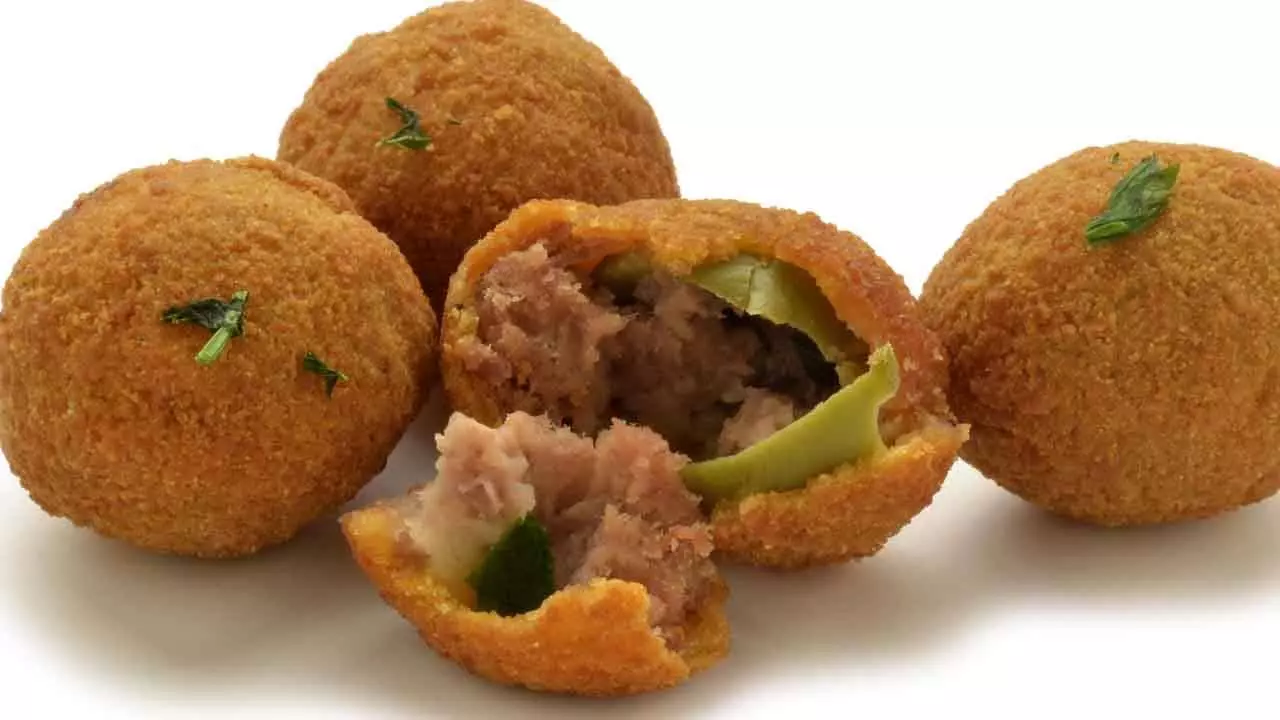Olives stuffed with minced meat and ham