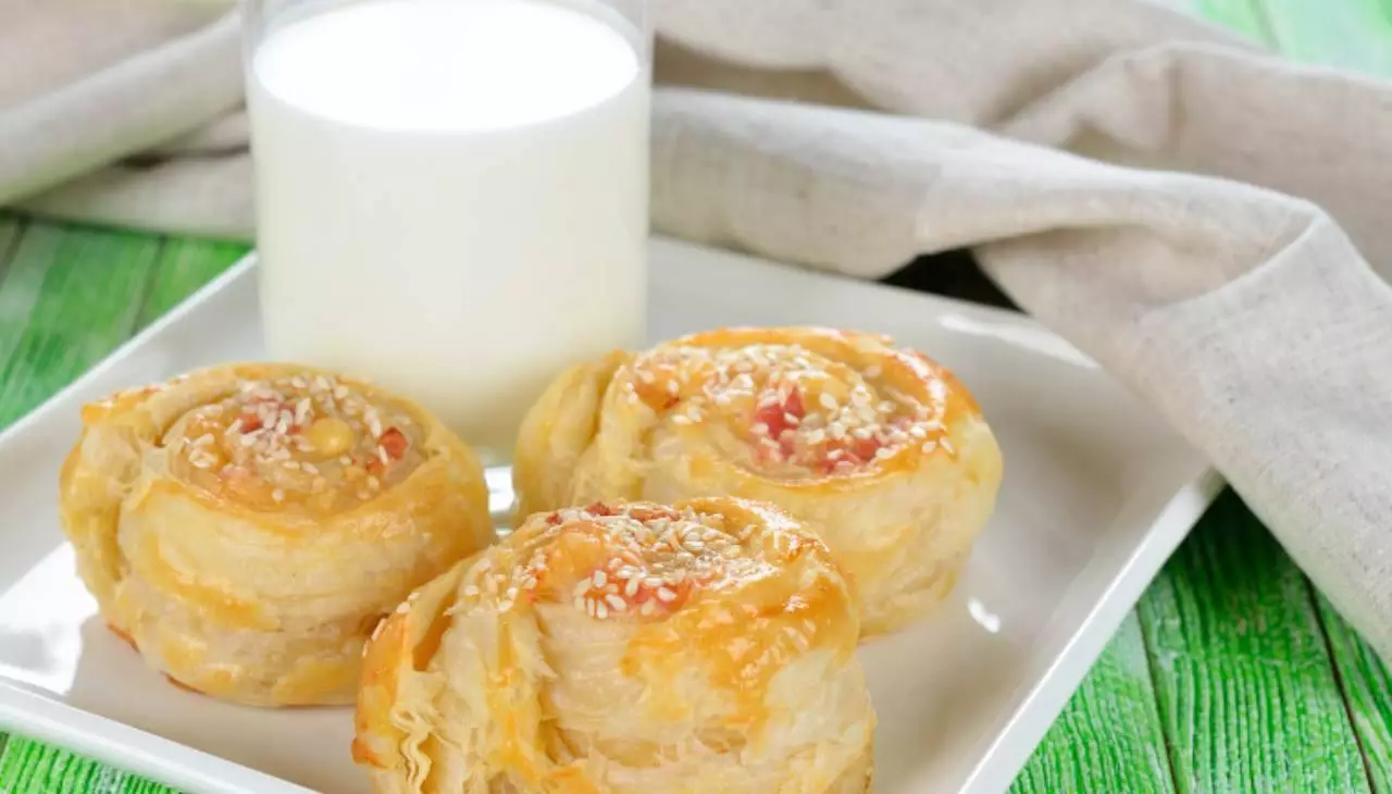 Puff pastry finger food with cheese and herbs