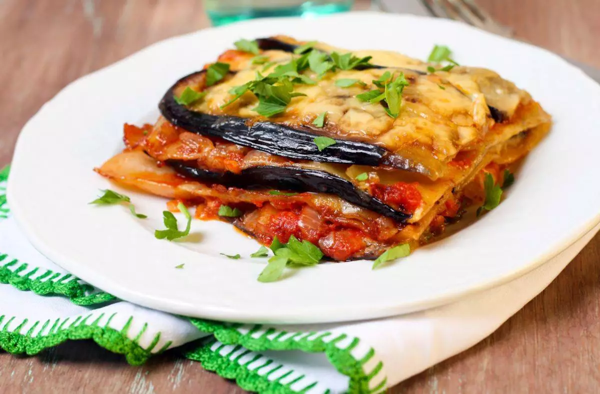 Lasagna with aubergines and tomato scamorza