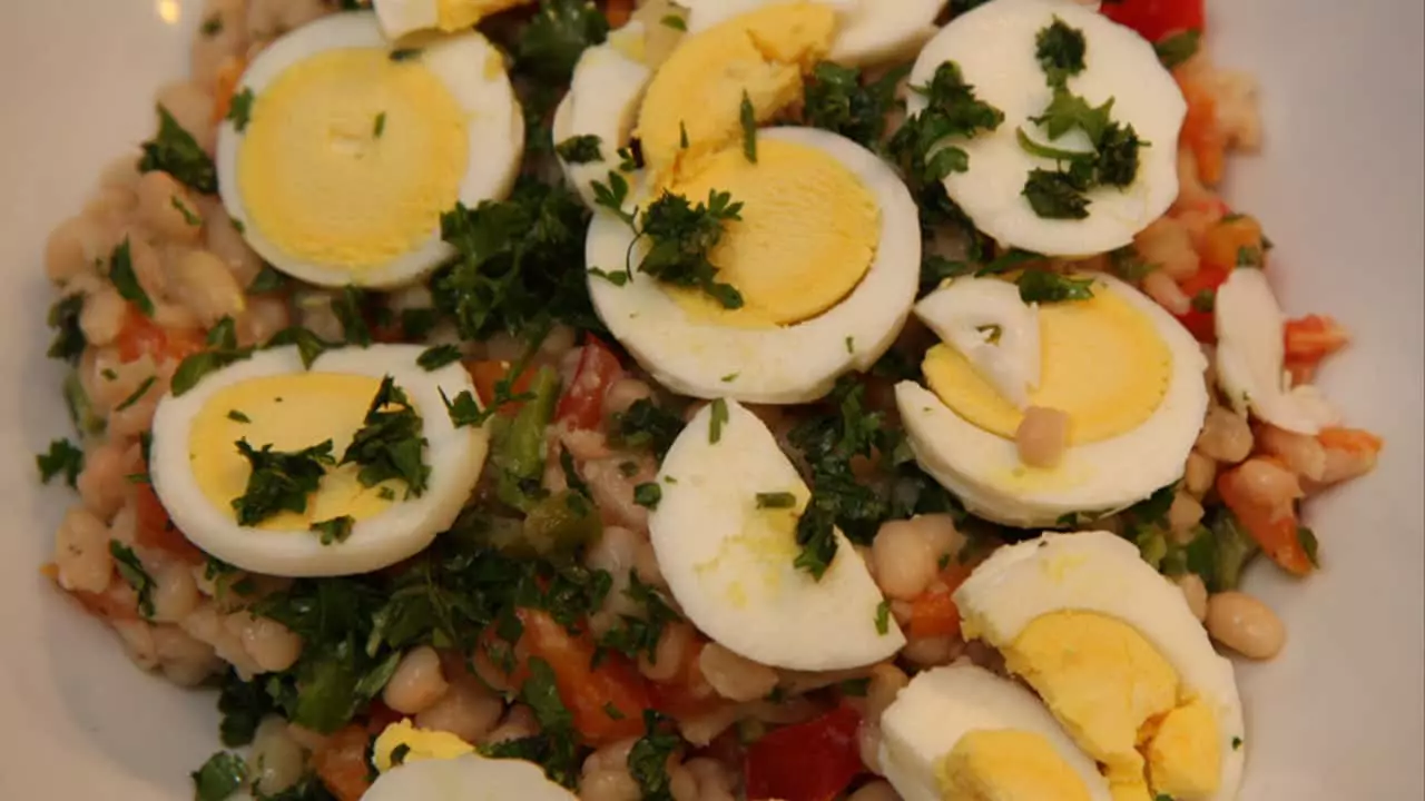 White bean salad from Spain and hard-boiled eggs, fresh summer salad