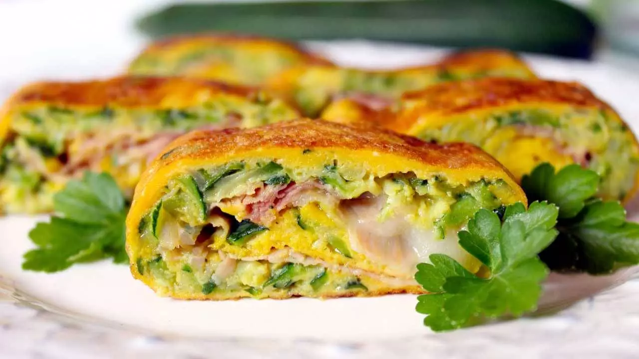 Omelet mei ham en courgettes | Súkses oan 'e tafel is garandearre!