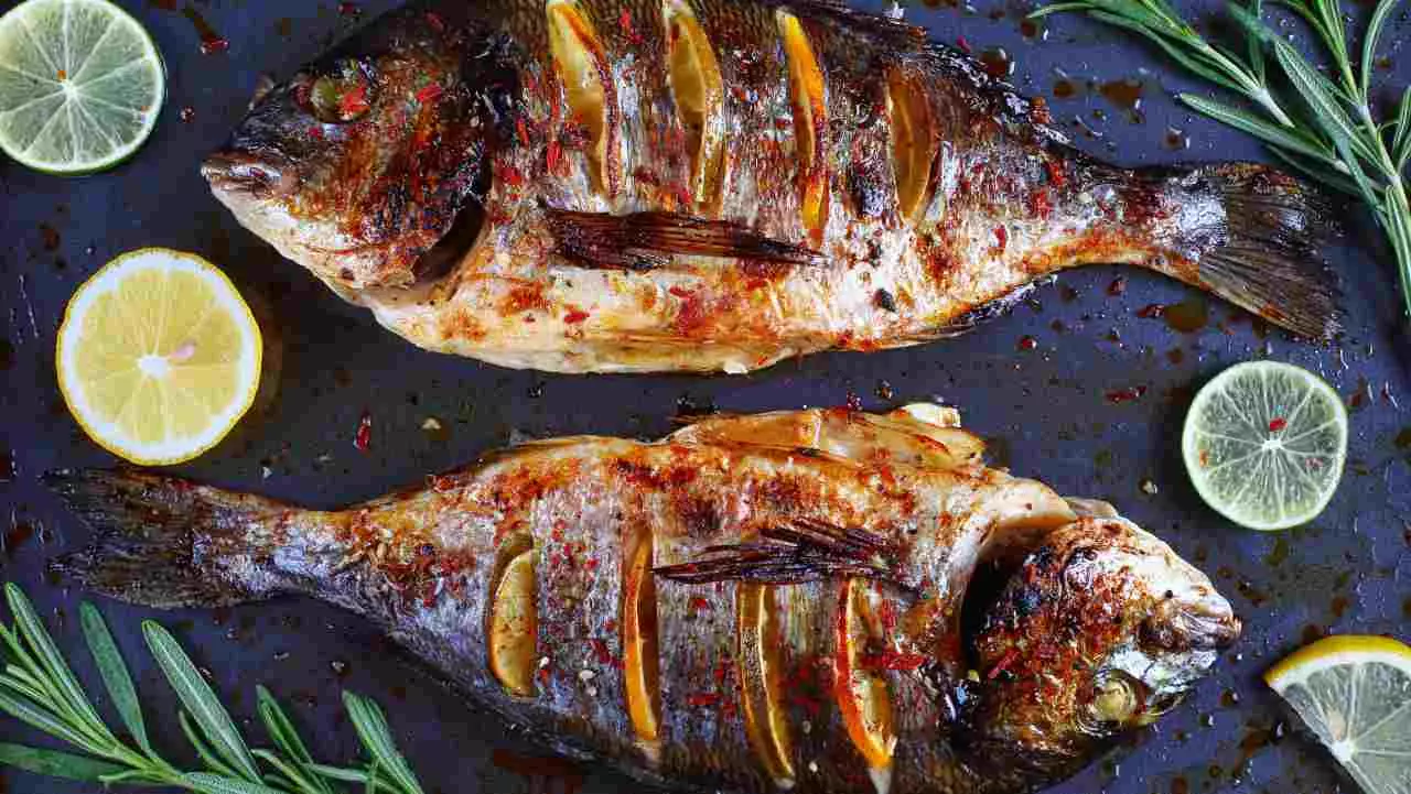 Baked sea bream with orange and lemon, simple and tasty recipe