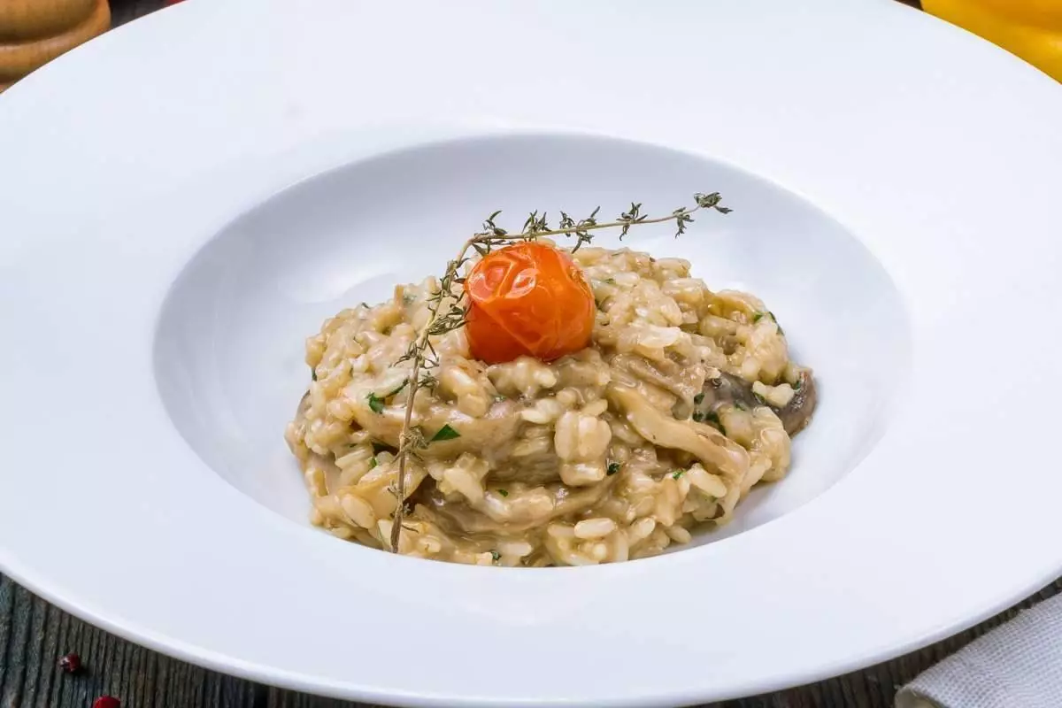 Risotto alla norcina pirmasis Umbrijos virtuvės patiekalas, labai skanus