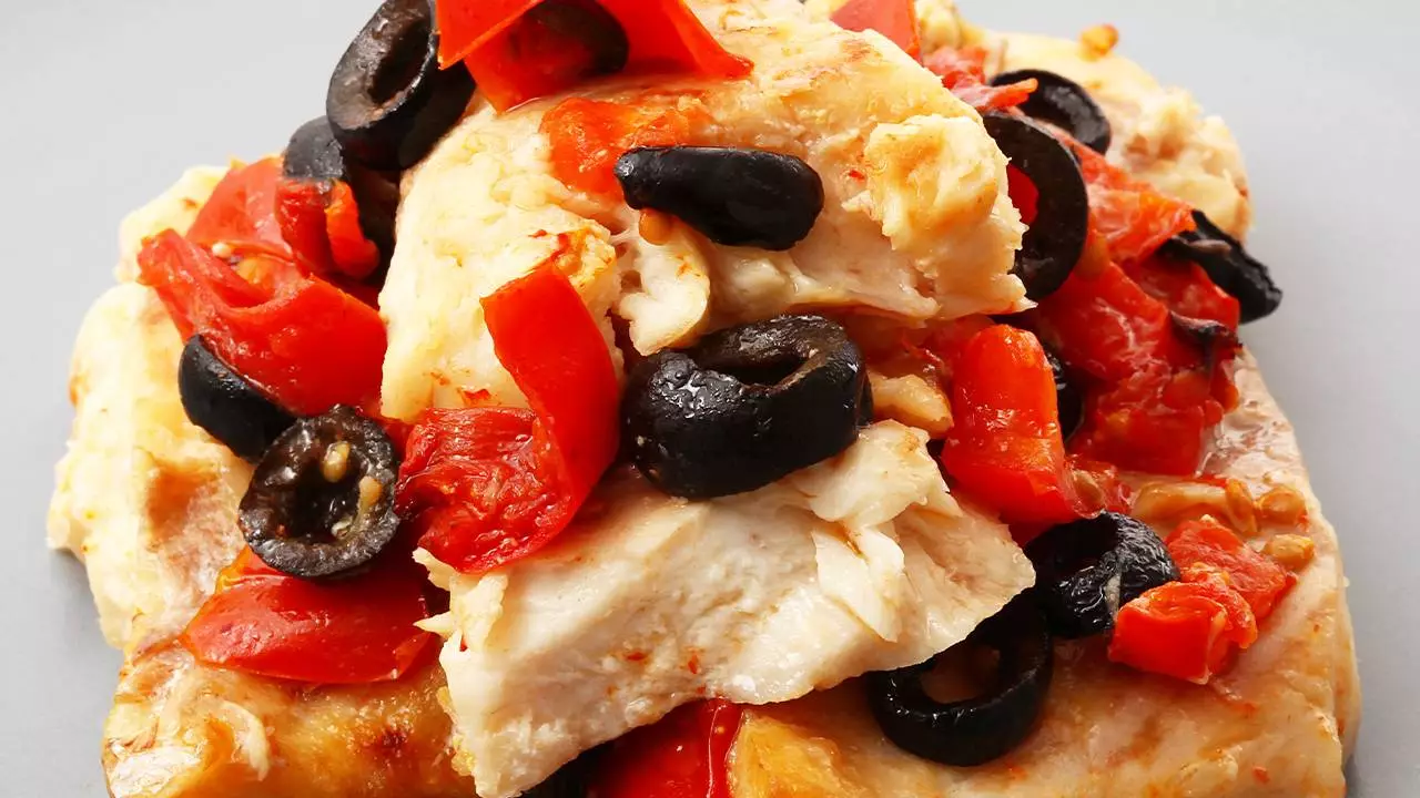 Fish with cherry tomatoes and olives